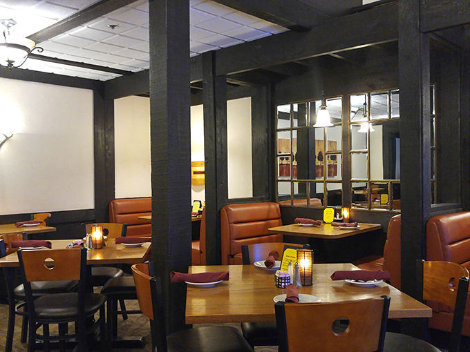 Cozy booths and warm lighting create intimate dining spaces where conversations flow as smoothly as the wine and laughter comes easily.