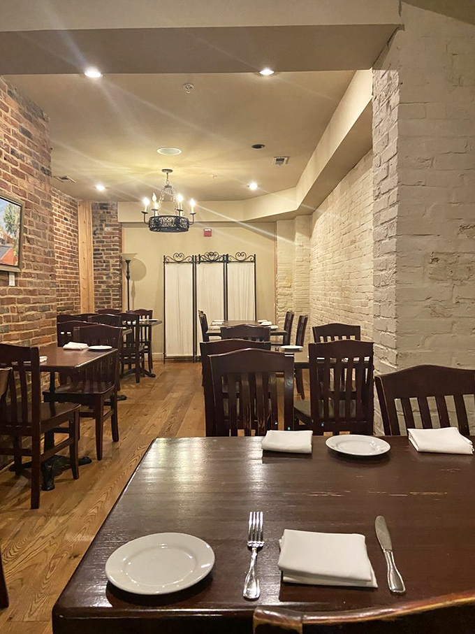 Exposed brick and warm woods create the kind of dining room where you instantly feel at home, yet special enough for celebration.