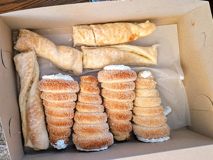 Sweet treasures in a cardboard ark. These cream horns and snoogles are the kind of treats grandparents use to win lifetime loyalty from grandchildren.