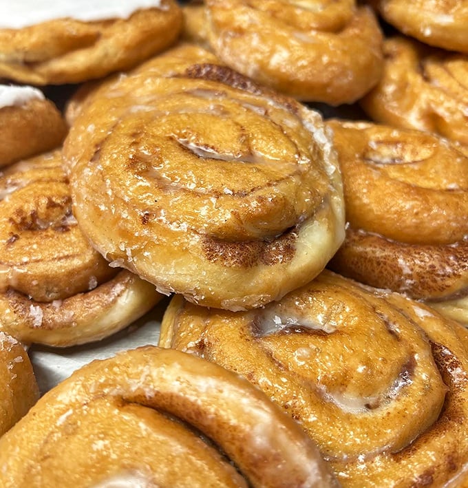 Sticky buns glistening with caramelized goodness. These spirals of joy are what cinnamon dreams about at night.