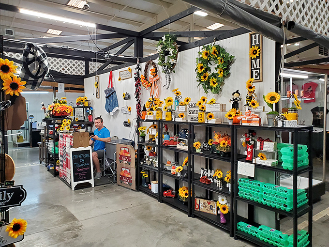 Sunflower heaven! This cheerful booth transforms the industrial market space into a golden garden of home decor and seasonal treasures.