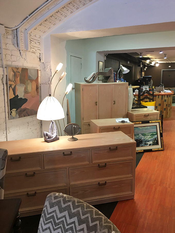 Lighting the way to better home design. This blonde wood dresser and artfully arranged lamps create a mid-century moment waiting to transform someone's bedroom.