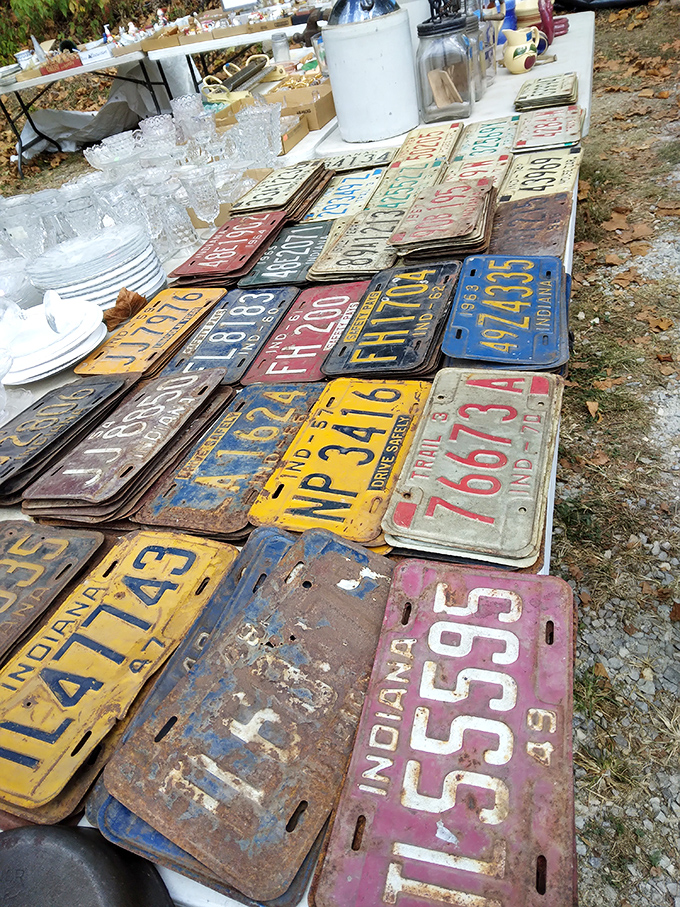 Vintage license plates tell stories of roads traveled and eras past. Each rusted, paint-chipped rectangle represents someone's journey through the Hoosier state.