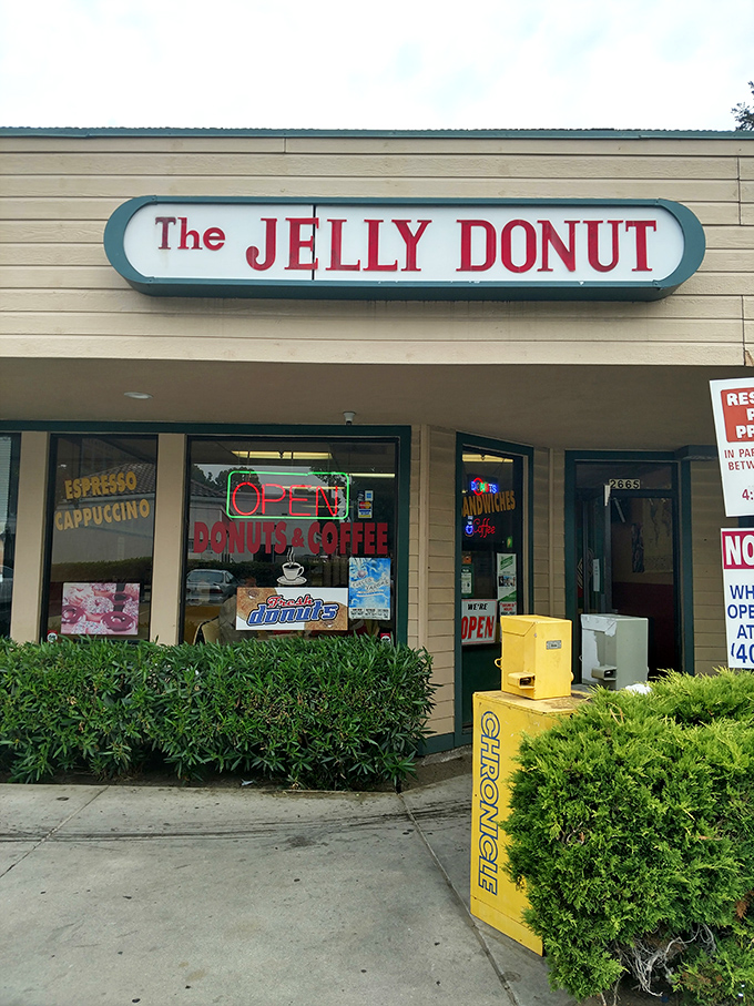 The Jelly Donut's straightforward sign makes a simple promise it fully intends to keep &ndash; deliciousness awaits within.