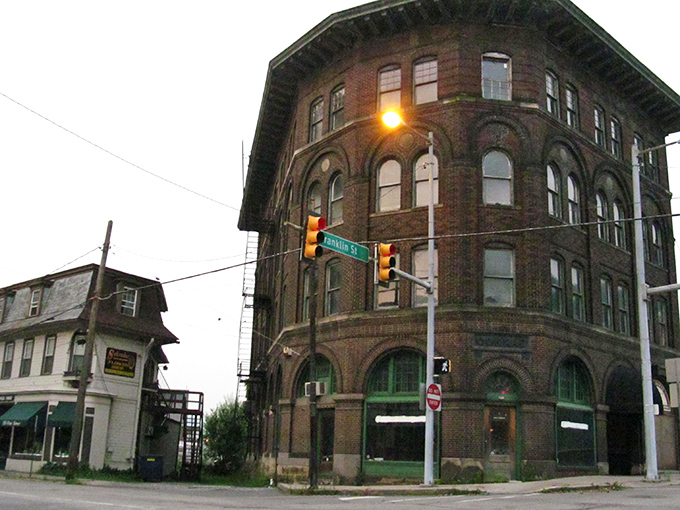 Johnstown's historic Flatiron Building anchors a corner downtown, its distinctive shape and brick construction a landmark in this budget-friendly Pennsylvania town.