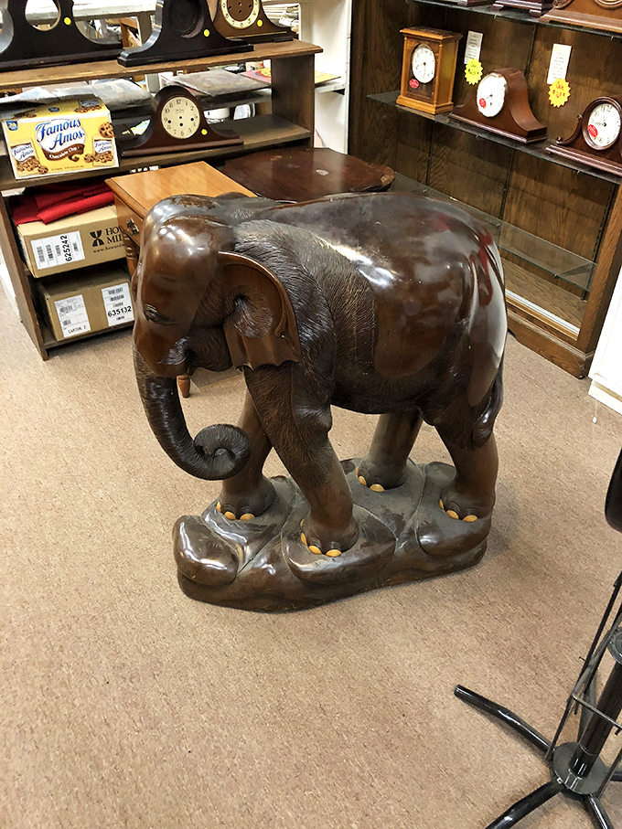 This wooden elephant doesn't forget anything—especially how much you'll regret not taking him home when someone else does.