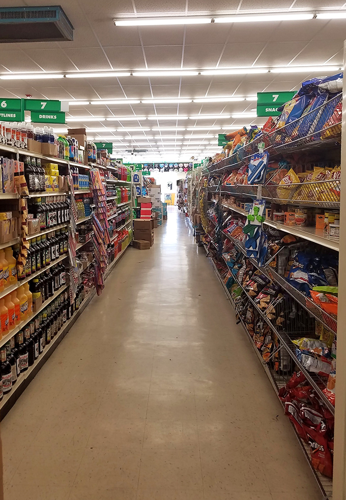 Aisle 7 leads shoppers down the path of snack righteousness. This fluorescent-lit corridor of affordable indulgence is a testament to American abundance.
