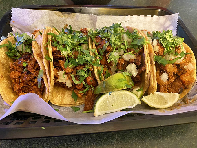 Authentic tacos don't need to shout with excess toppings. These al pastor beauties let simple ingredients&mdash;meat, cilantro, onion, and lime&mdash;sing in harmony.