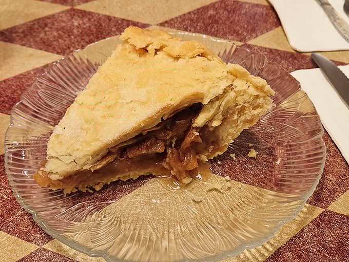 Apple pie with a crust so flaky it should be illegal, filled with apples that maintain their dignity instead of dissolving into mush.