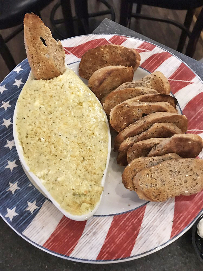 This artichoke dip isn't playing around. Served on a patriotic plate with plenty of crispy dippers, it's the appetizer equivalent of a warm hug.