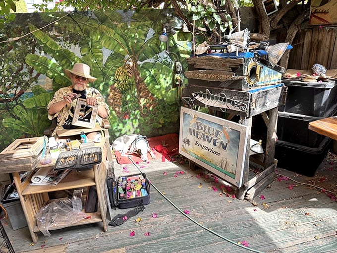 The "Blue Heaven Emporium" feels like you've stumbled upon a secret artist's workshop hidden in the tropical foliage.