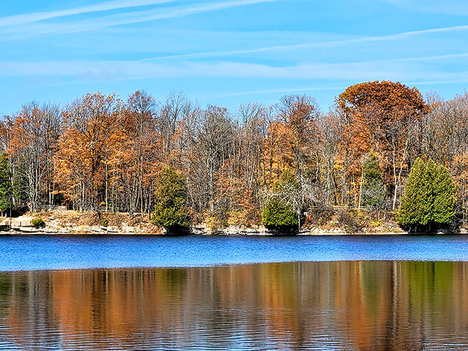 Fall paints the shoreline in warm hues that reflect perfectly in still waters. Nature's most spectacular art show happens every year, free of charge.