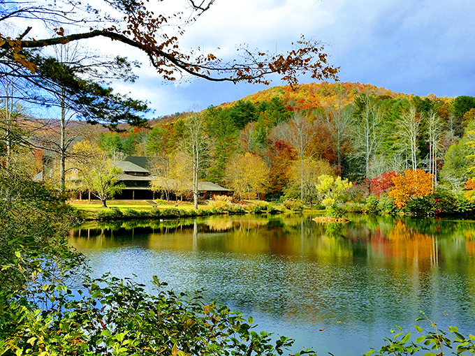 Fall foliage reflects perfectly in still waters, creating nature's most spectacular mirror selfie without a single filter needed.
