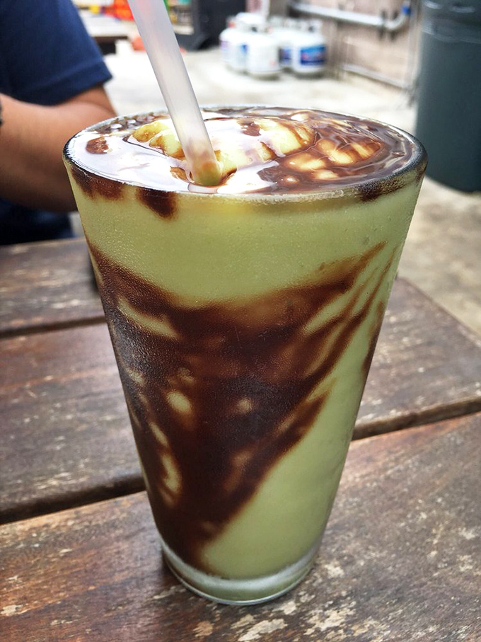 This isn't just a milkshake&mdash;it's modern art. Swirls of chocolate sauce transform a creamy avocado shake into a drinkable Jackson Pollock.