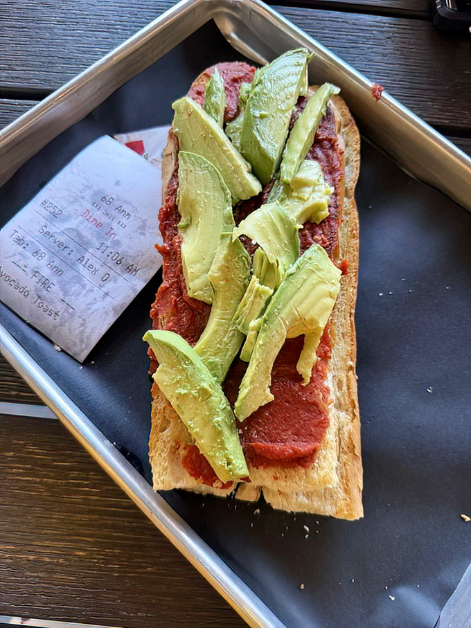 Avocado toast gets the Cuban treatment, proving that even trendy breakfast items can find new life when served on bread that's been perfected over generations.