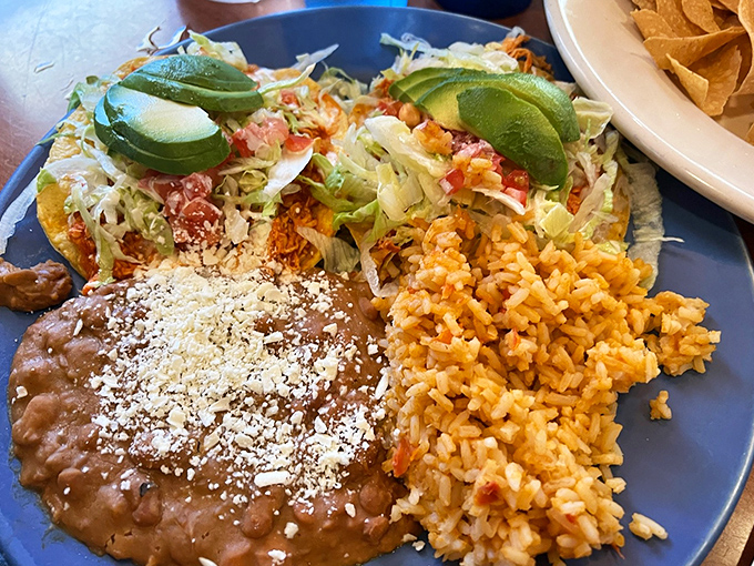 Mexican flavors done diner-style: vibrant, generous, and absolutely requiring both hands and several napkins to properly enjoy.