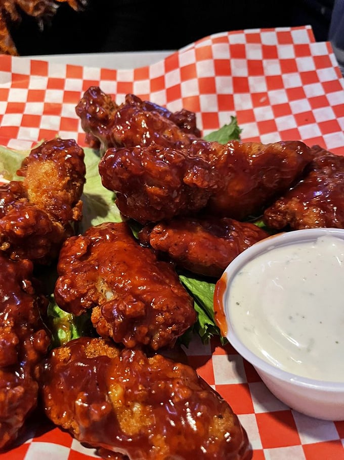 Wings that don't play second fiddle to the seafood. Glazed with sticky-sweet sauce and served with cooling ranch&mdash;a perfect flavor balancing act.