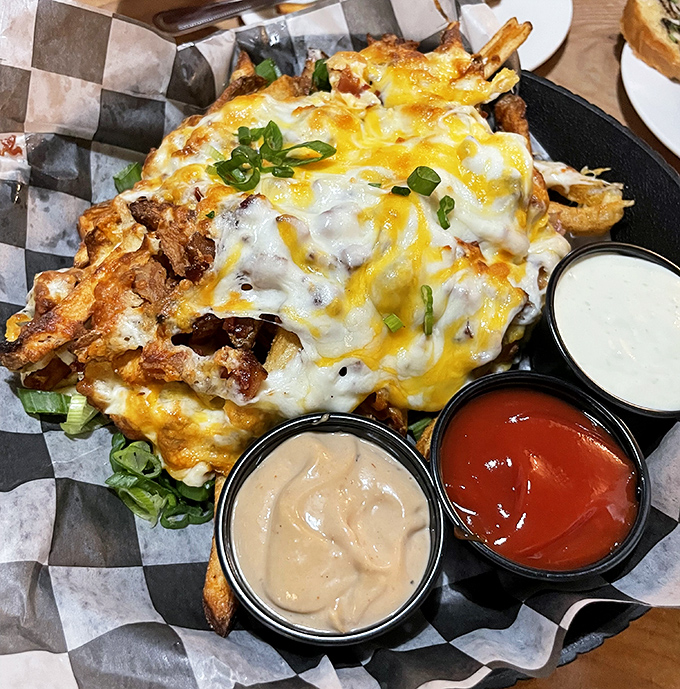Fries ascend to their higher purpose when blanketed in cheese and bacon. Three dipping sauces because important decisions shouldn't be forced upon you.