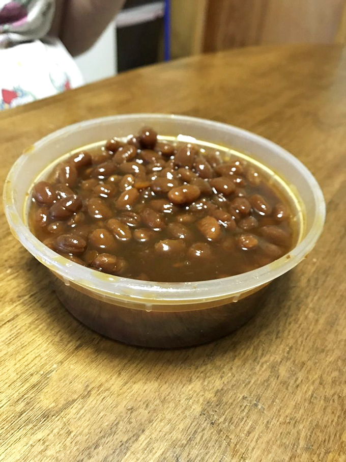 Baked beans swimming in sweet, tangy sauce&mdash;the unsung hero of any proper chicken feast. Simple, satisfying, and somehow better than homemade.