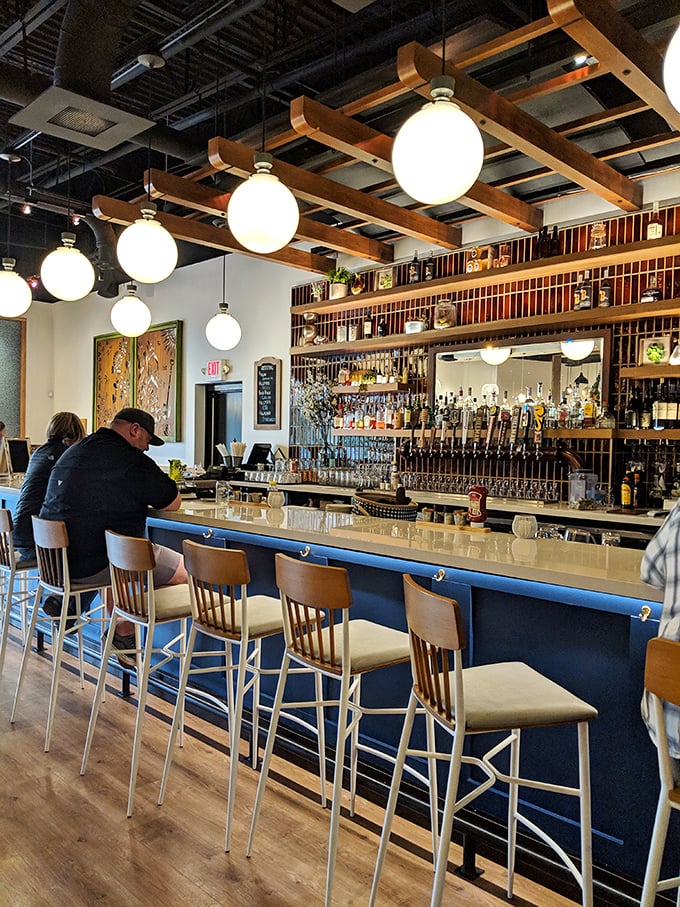 A bar stocked so thoroughly it looks like it's preparing for both celebration and apocalypse&mdash;my kind of planning.