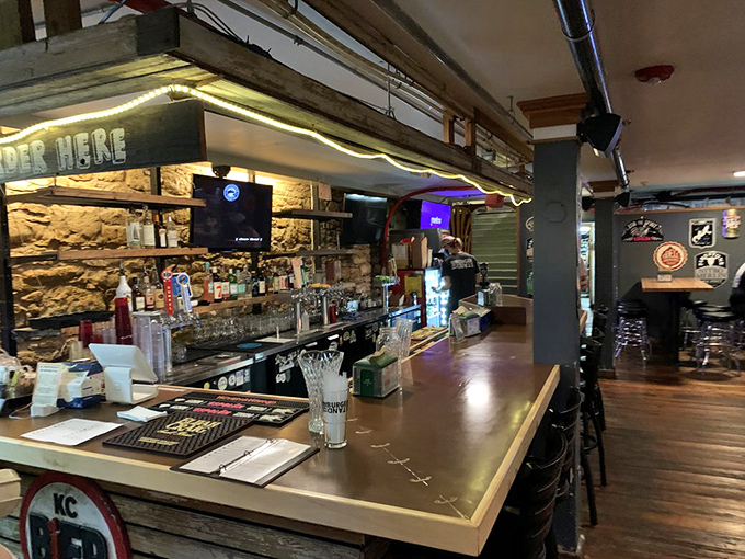 This bar doesn't just serve drinks—it creates the perfect stage for that moment when your burger arrives and time stands still.