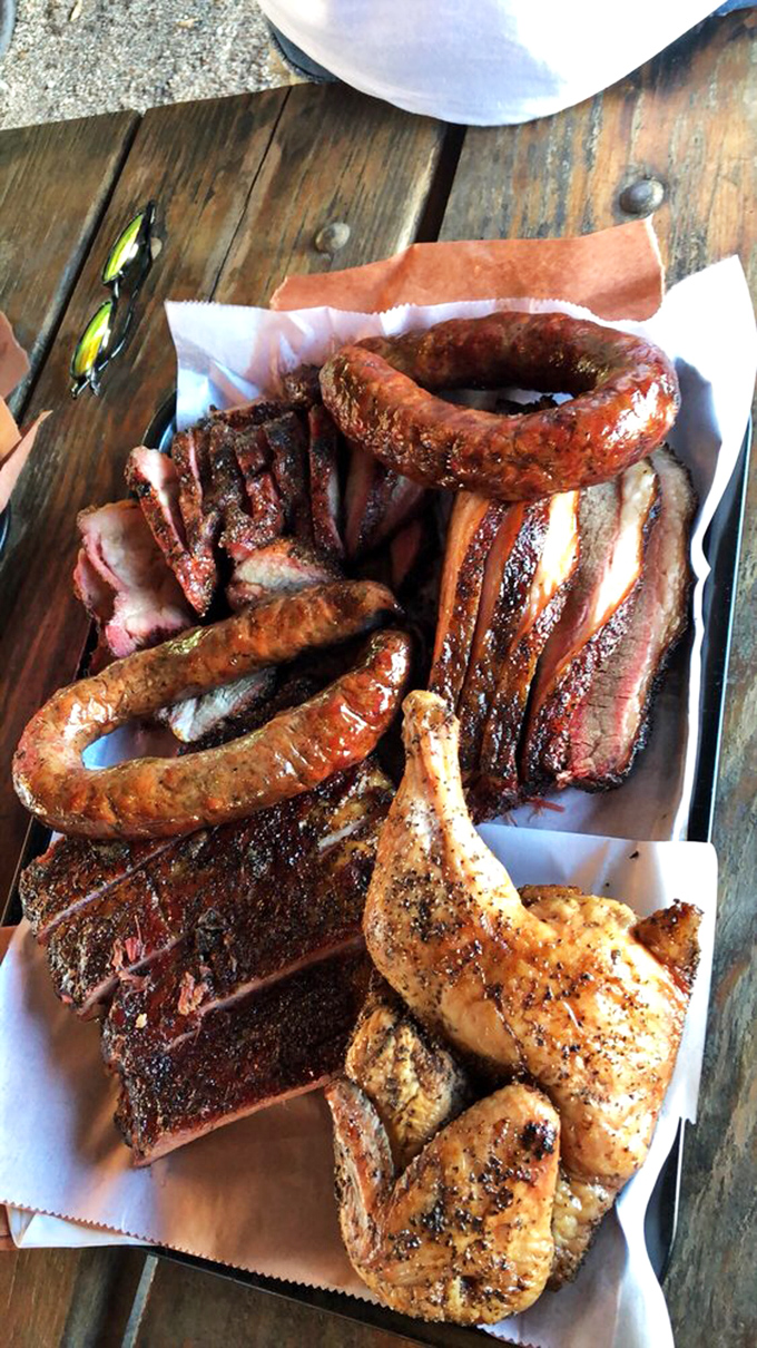 A barbecue sampler that's less a meal and more a religious experience &ndash; the kind of platter that makes vegetarians question their life choices.