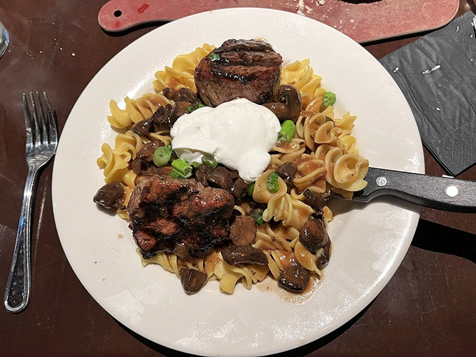 Beef stroganoff reimagined with steakhouse flair. Those medallions aren't just sitting on pasta&mdash;they're holding court on a throne of noodles.