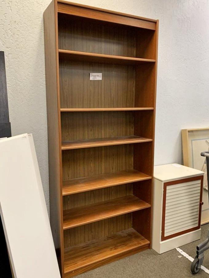 Another solid bookcase stands ready to organize your life and display your most treasured volumes. 