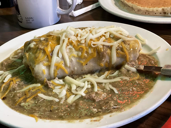 The breakfast burrito that launched a thousand food dreams. Smothered in green chili and cheese, it's the morning meal that might just ruin all other breakfasts.