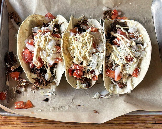 Brisket tacos that bridge Tex-Mex traditions&mdash;smoky, tender meat with fresh toppings that dance between two culinary worlds.