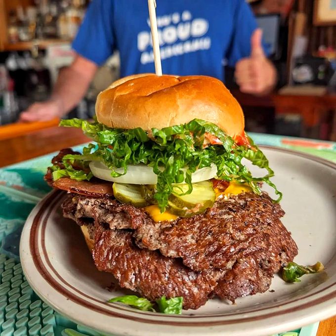 This isn't just a burger; it's a masterpiece of smoke, beef, and toppings that makes ordinary burgers hang their heads in shame.
