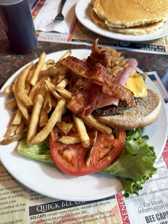 A burger that doesn't need fancy aioli or artisanal buns to impress&mdash;just honest ingredients stacked high with bacon that means business.