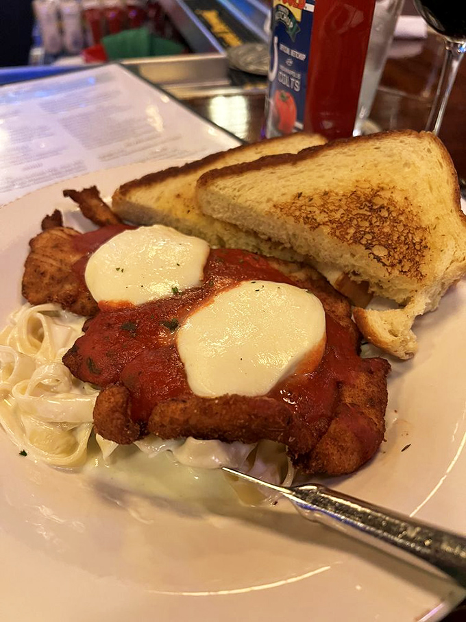 Chicken Parmesan that doesn't need to show off&mdash;it just delivers. That melted cheese is performing a love song to your taste buds.