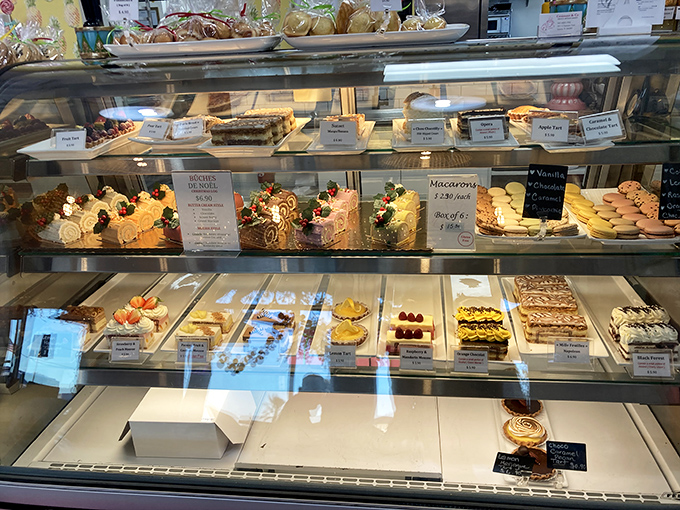 A glass case of temptation that should come with a warning label. These aren't just desserts &ndash; they're edible art with a sugar high.