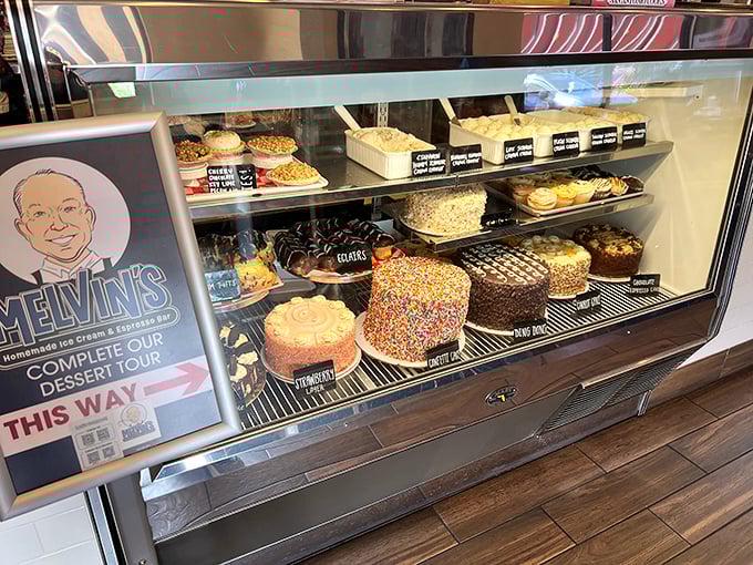 A dessert case that doesn't just tempt&mdash;it practically sings to you. That sprinkle cake is performing a full Broadway musical number.