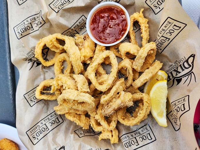 Golden rings of joy. These calamari, fried to perfection and served with tangy dipping sauce, make you forget you're eating something with tentacles.