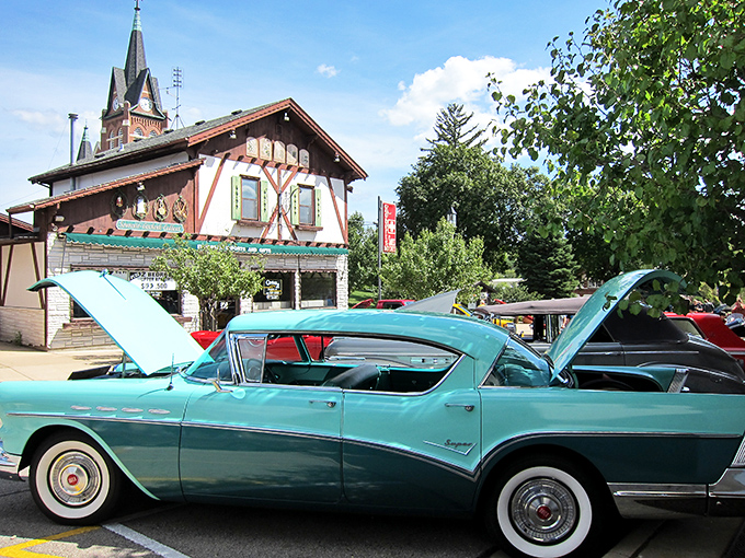 Classic cars meet classic architecture during New Glarus car shows &ndash; automotive Americana against a backdrop of Swiss precision.