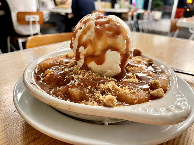 This dessert doesn't just end the meal&mdash;it provides closure. Warm apple crisp with ice cream melting into caramel creates the perfect sweet finale.