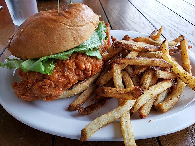 A chicken sandwich that's dressed for success&mdash;crispy, juicy, and ready for its close-up, with a side of hand-cut fries.