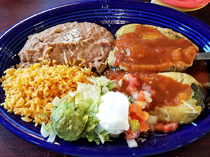 The Chile Relleno isn't just stuffed&mdash;it's fulfilled. This plate delivers the holy trinity of Mexican comfort: perfectly seasoned rice, velvety beans, and cheese-filled chile.