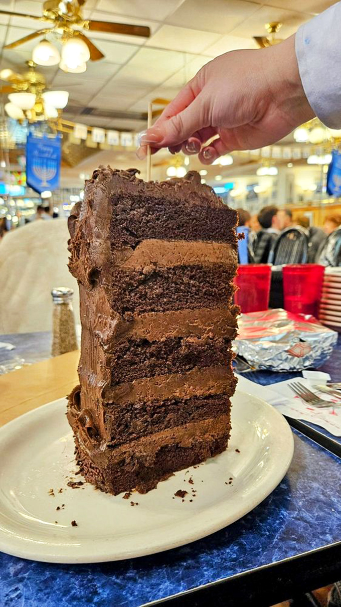This chocolate cake doesn't have layers&mdash;it has stories, chapters, and possibly an entire epic trilogy. Fork for scale, courage required to finish.
