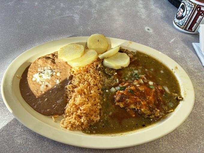 A plate that says "I love you" in the universal language of chorizo, potatoes, and green chile sauce.