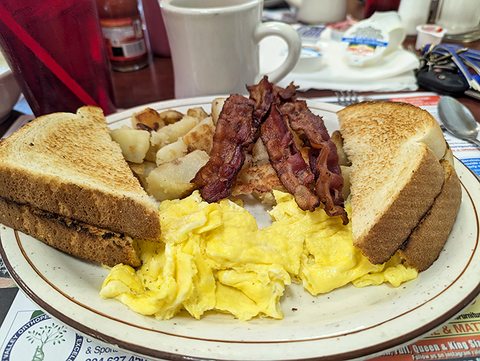 The breakfast that launched a thousand productive days. Toast, eggs, bacon, and home fries&mdash;the Mount Rushmore of morning meals.