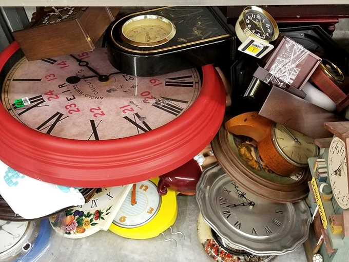 A collection of timepieces that proves even time itself gets recycled. That red wall clock might have witnessed decades of family dinners.