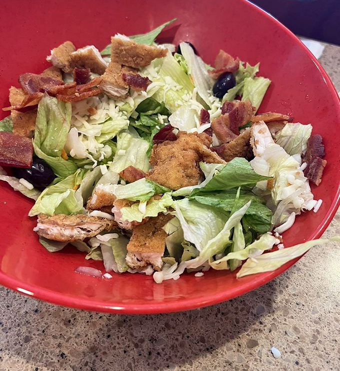 This isn't just a salad&mdash;it's a carefully constructed garden of crunch, featuring fresh greens, savory bacon, and golden croutons in perfect proportion.