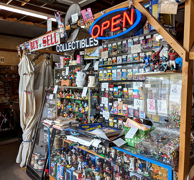 "Buy & Sell" isn't just a sign&mdash;it's a philosophy at this booth where pop culture treasures await their perfect match.