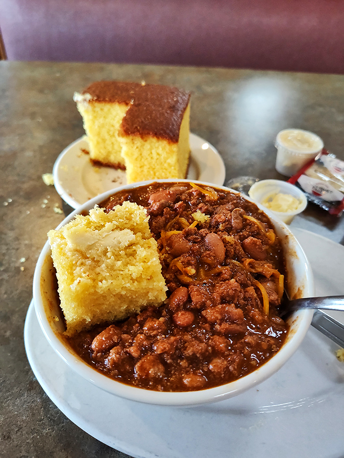 Cornbread meets chili in a bowl of pure Midwestern comfort. It's the culinary equivalent of a warm blanket on a cold Illinois day.