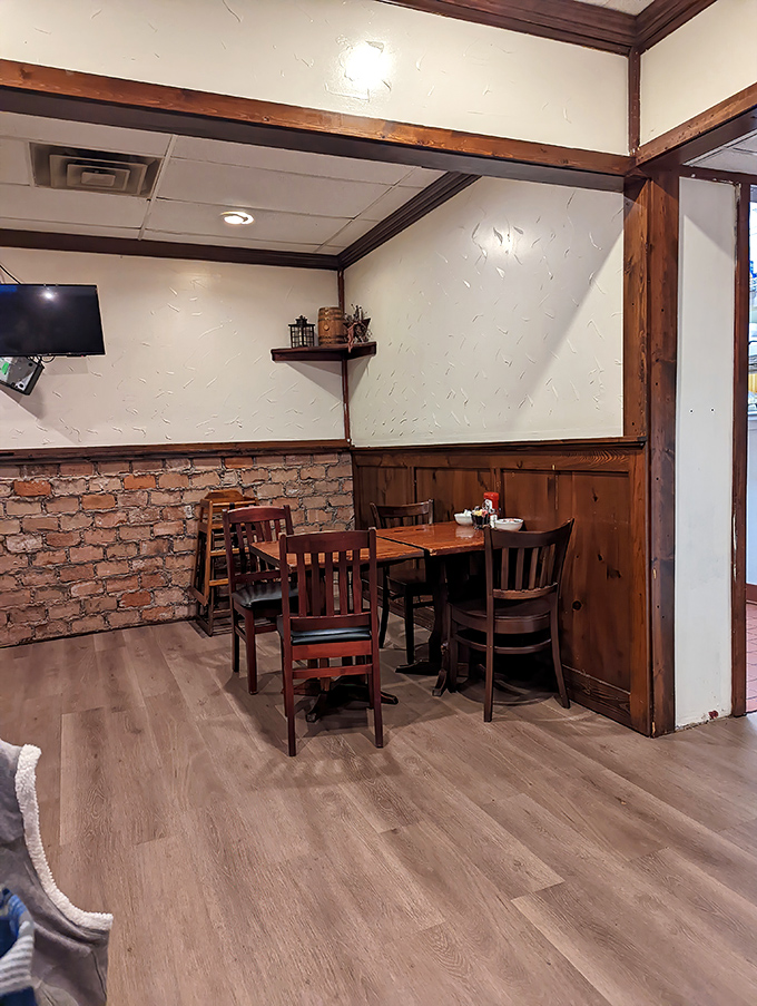 Cozy corner tables with exposed brick and wooden charm&mdash;the kind of spot where you'll linger long after your plate is clean.