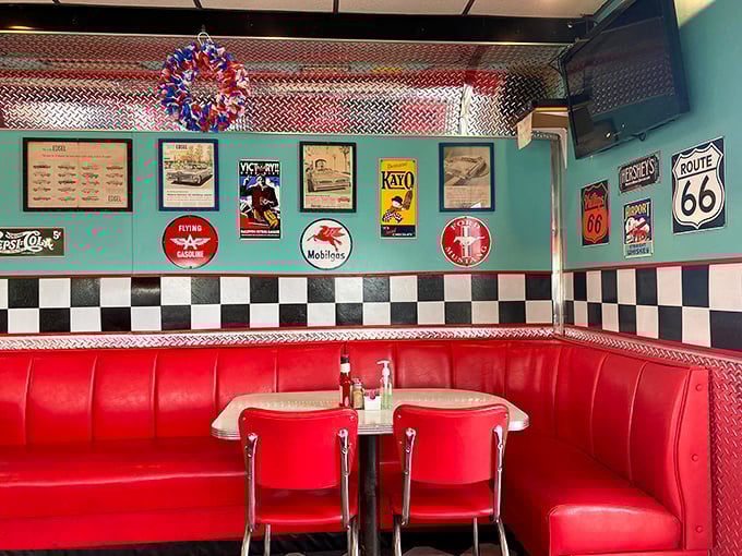 This corner booth has probably witnessed first dates, family celebrations, and road trip pit stops. The red vinyl has stories to tell. 