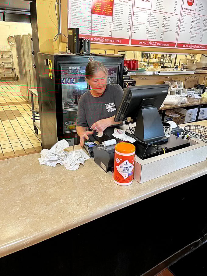 The counter&mdash;where solo diners find community, regulars have "their spot," and servers perform the silent coffee refill dance with practiced precision.